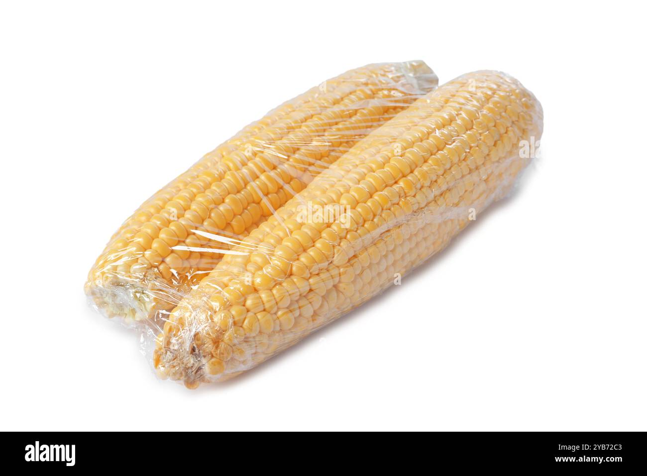 Fresh corncobs with plastic food wrap isolated on white Stock Photo - Alamy