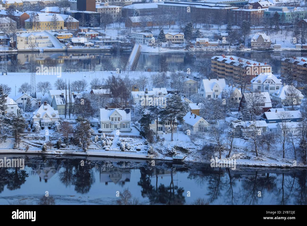 Winter in Trondheim, aerial view of the river Nidelva and historical ...