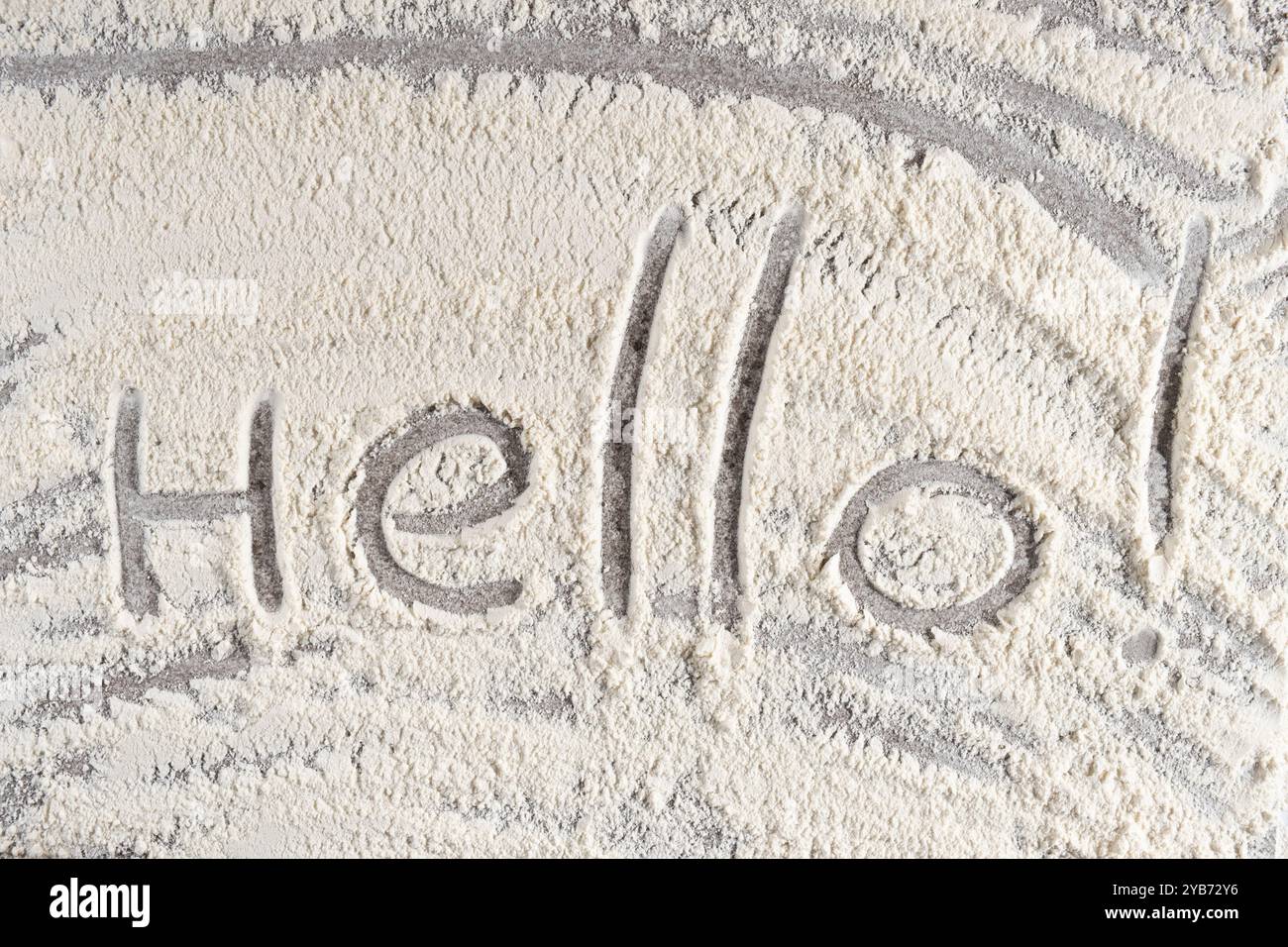 Grey cooking background of spilled wheat flour on stone background with ...