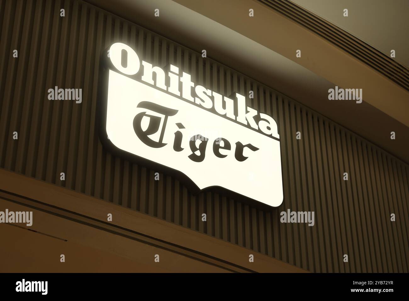Shanghai,China-Nov.26th 2022: close up Onitsuka Tiger store brand logo ...