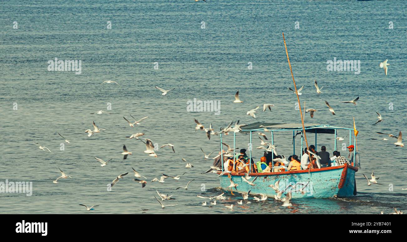 Varanasi, India. Tourists And Indian Pilgrims Floating On Ganga ...