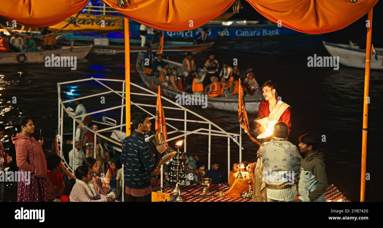 Varanasi, Uttar Pradesh, India. Brahman priest wearing red and yellow ...