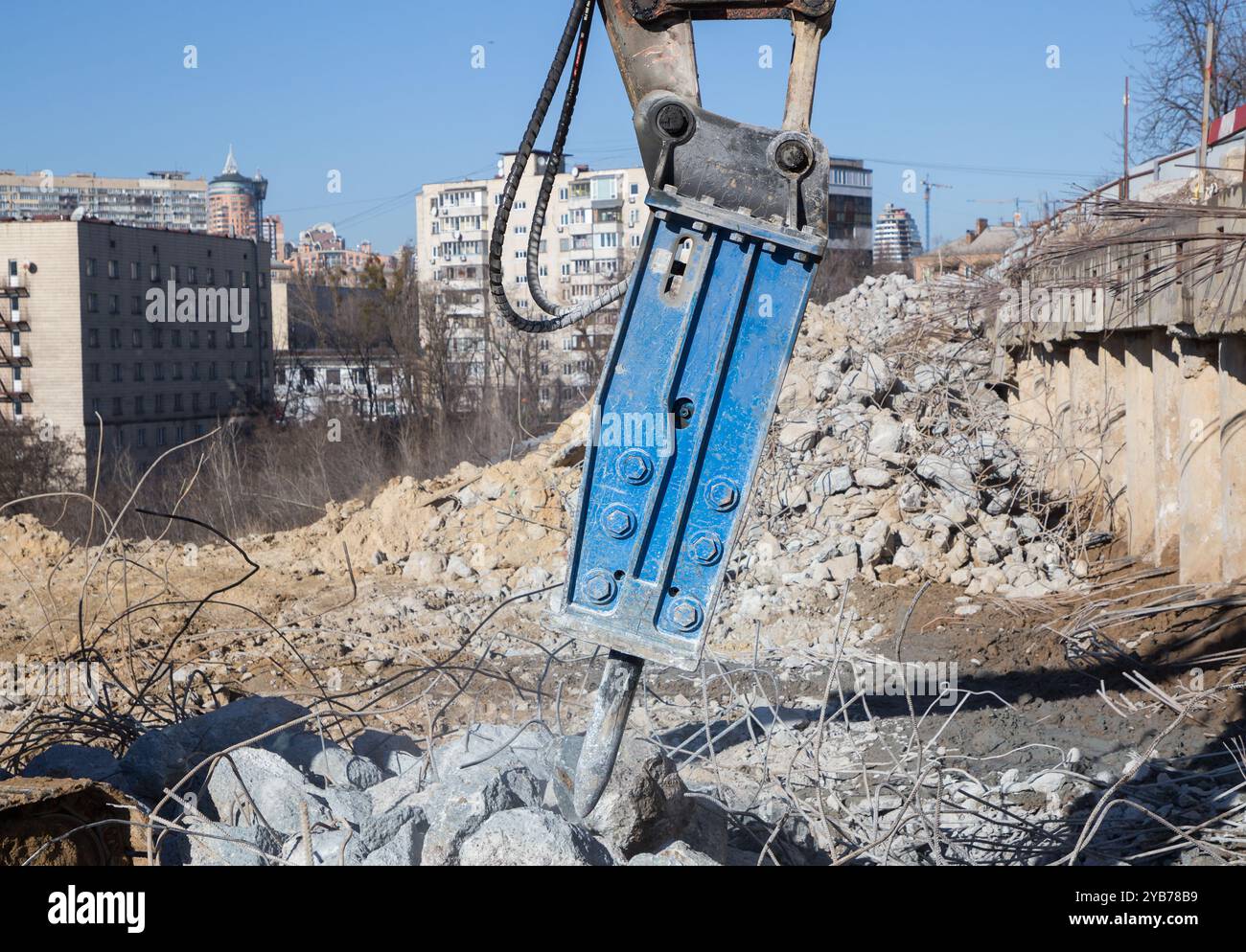 Industrial Hydraulic Hammer At Construction Site Performs Work On