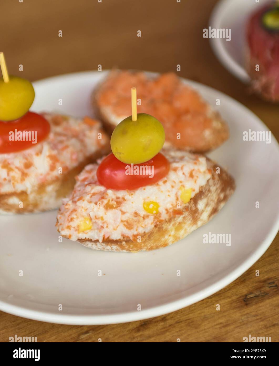 Various typical Spanish canapes, with ham, crab and tuna Stock Photo ...