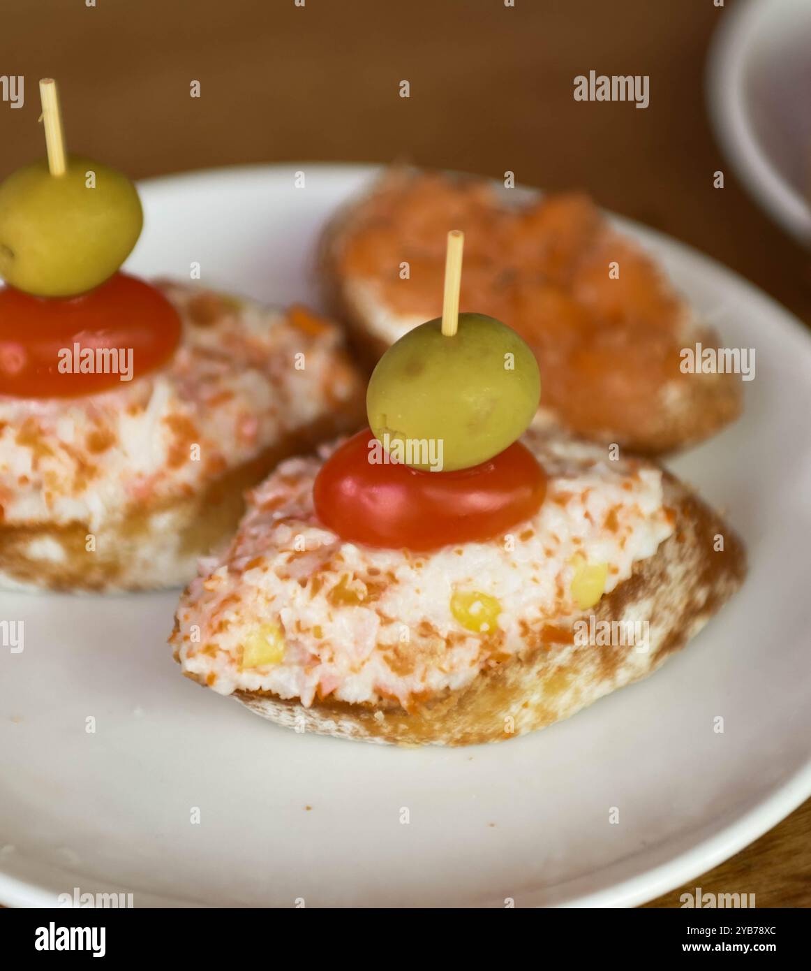 Various typical Spanish canapes, with ham, crab and tuna Stock Photo ...