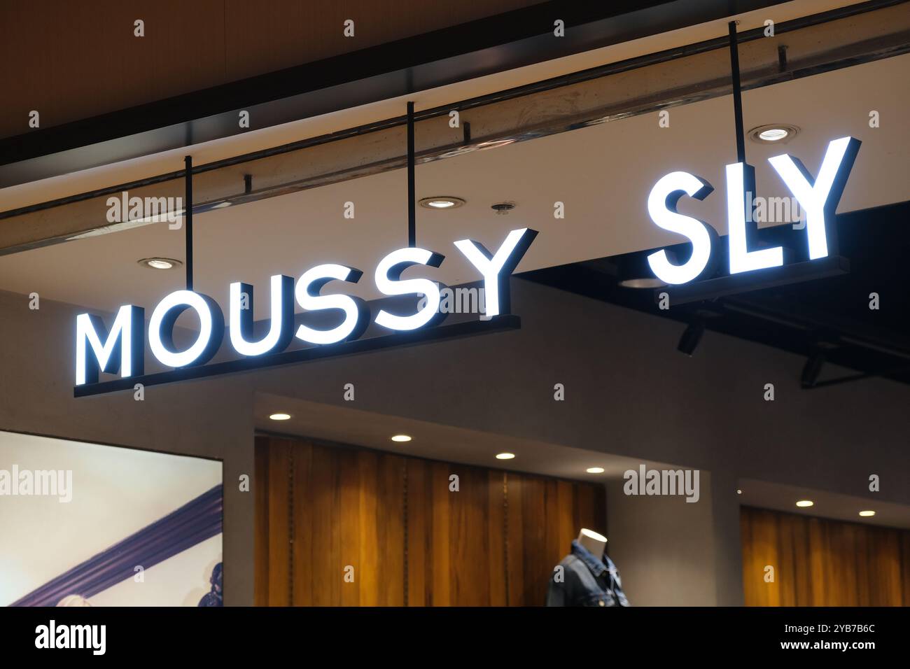 Shanghai,China-March 18th 2023: Moussy Sly store brand logo sign Stock Photo - Alamy