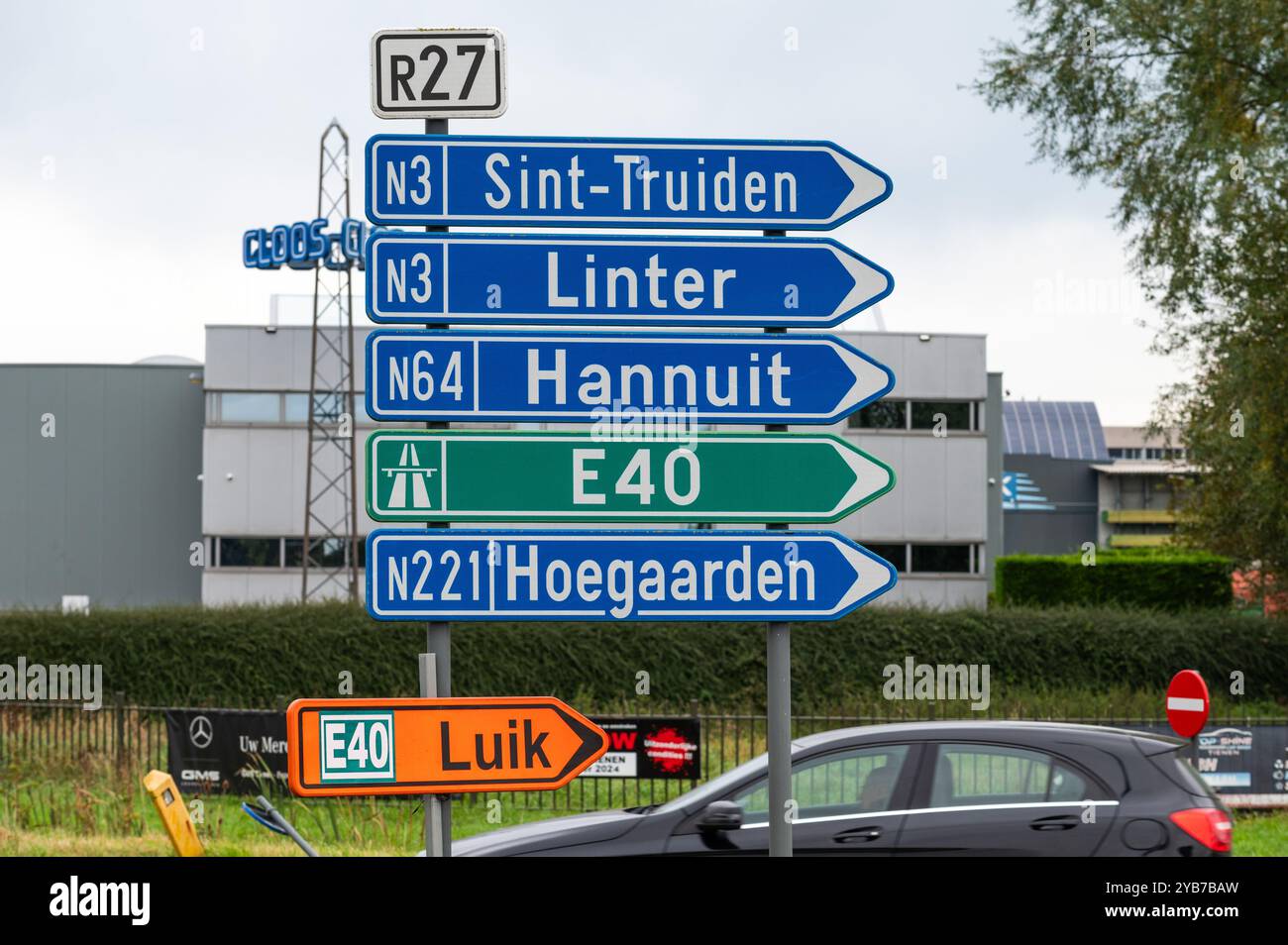 Direction signs to national roads and the E40 highway in Tienen ...