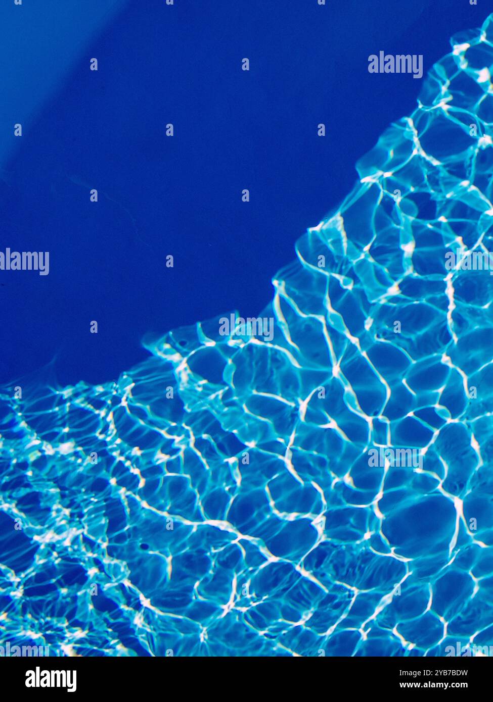 shimmering dayight reflections in swimming pool, dordogne, france Stock ...