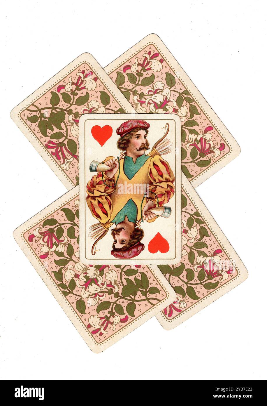 A montage of playing cards with one card revealed on a white background ...