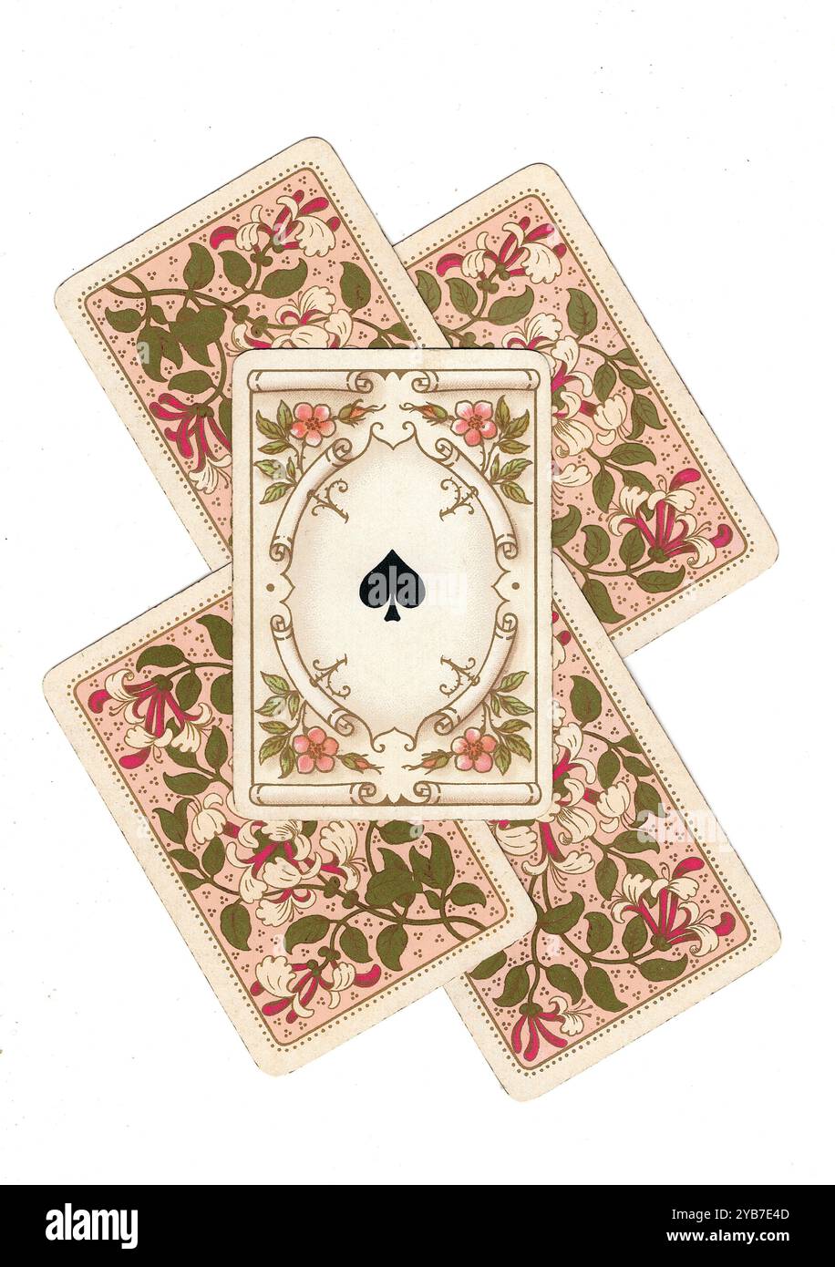 A montage of playing cards with one card revealed on a white background ...