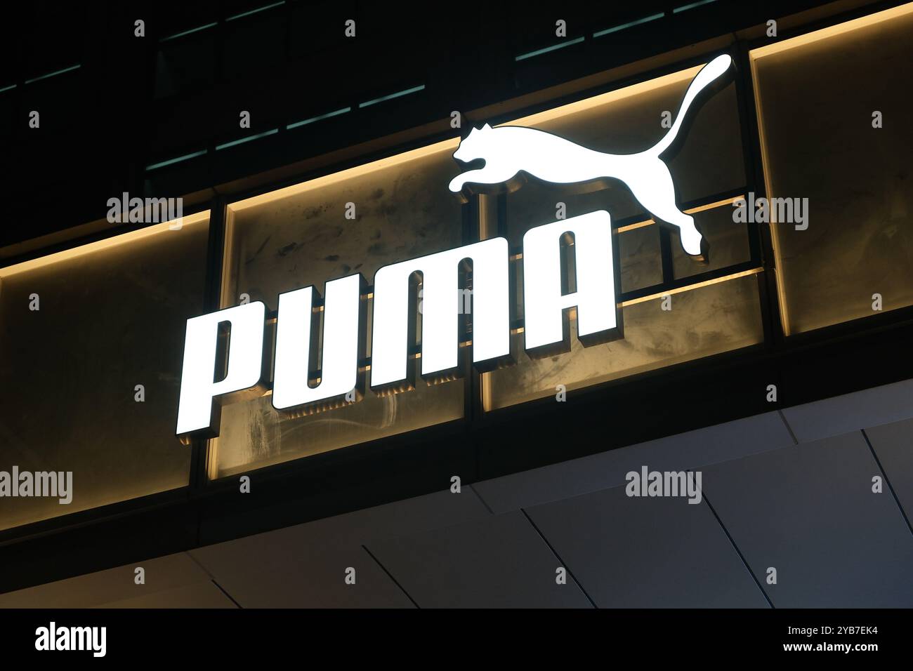 Puma store brand logo sign Stock Photo - Alamy