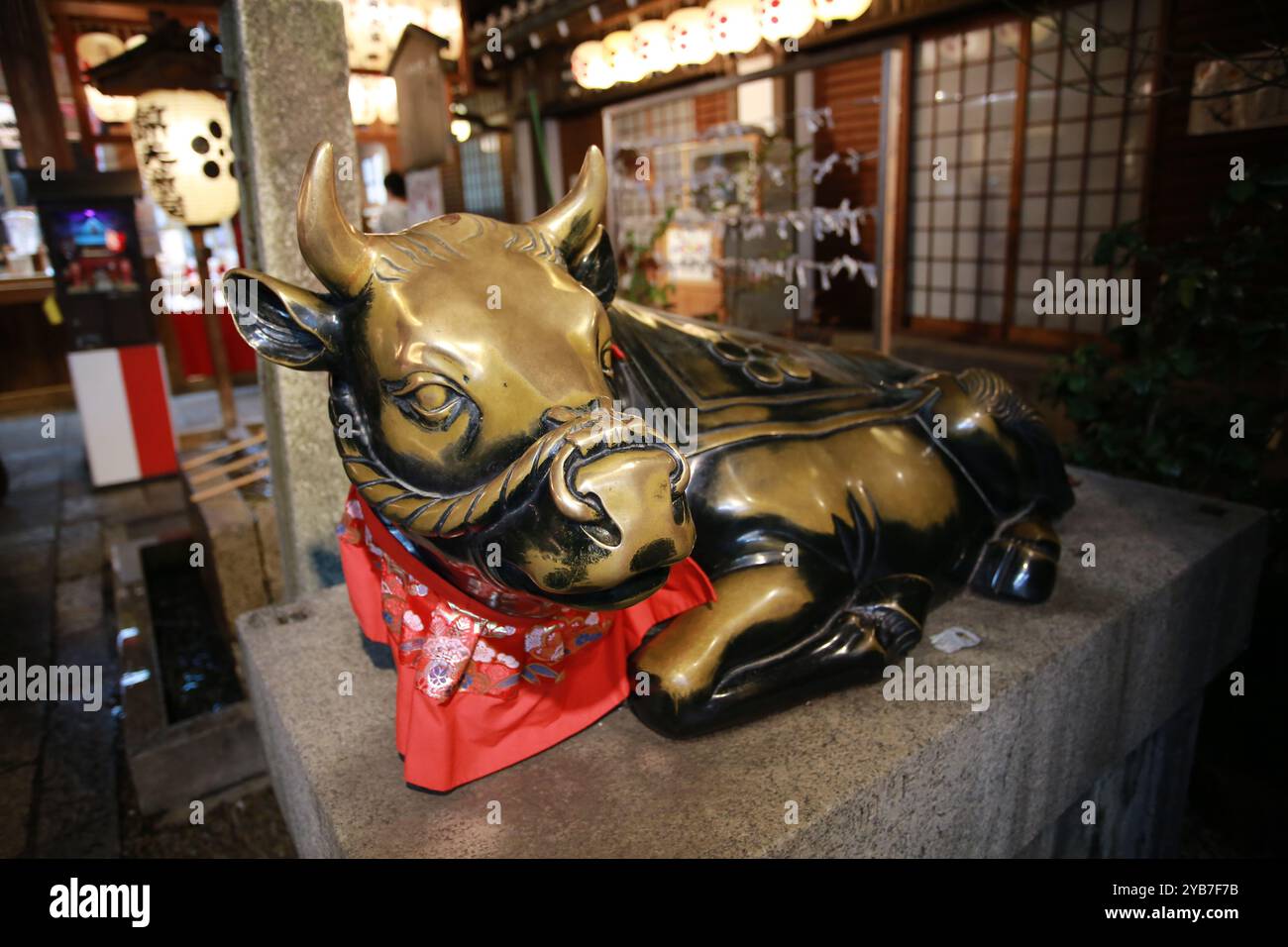 Kyoto, Japan- November 23 2016: a bronze statue of bull in Nishiki ...
