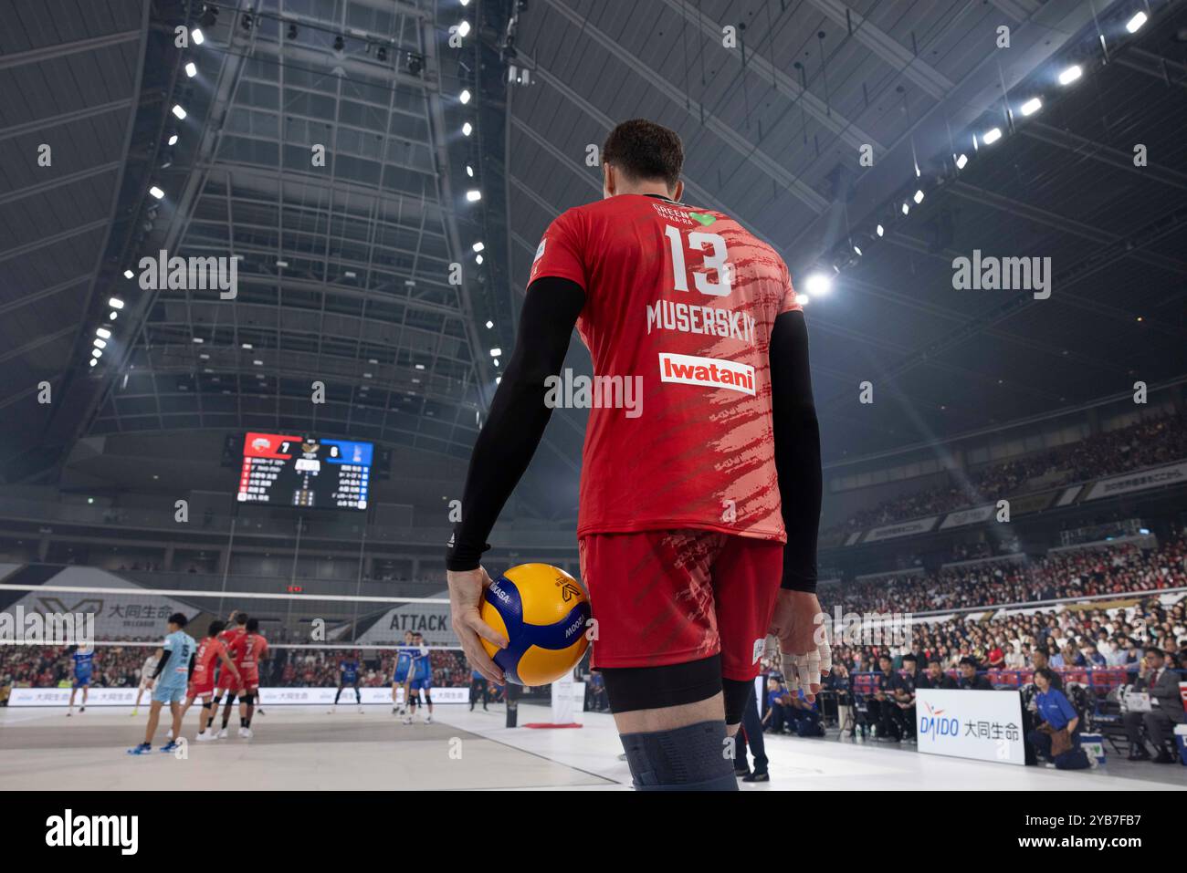 Dmitriy Muserskiy (13 OP) from Suntory Sunbirds Osaka prepares to serve the ball during the ...
