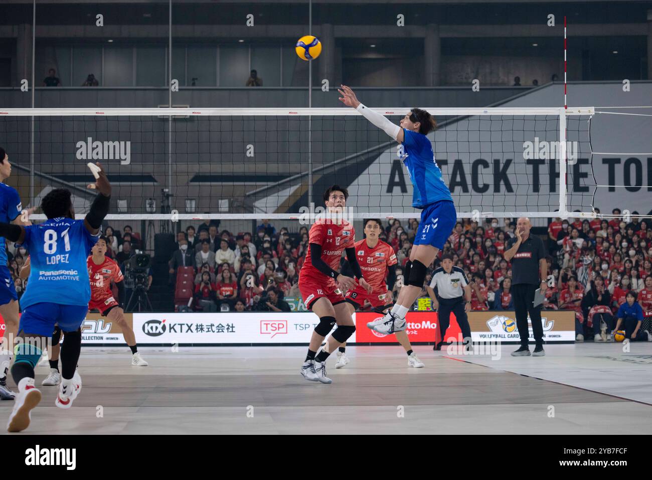 Motoki Eiro (21 S) from the Osaka Bluteon makes a pass at the net ...