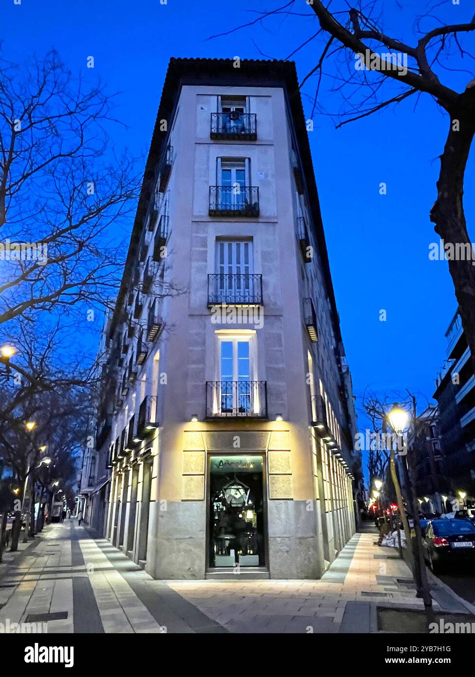 Facade of building, night view. Alcala street corner to Villanueva ...