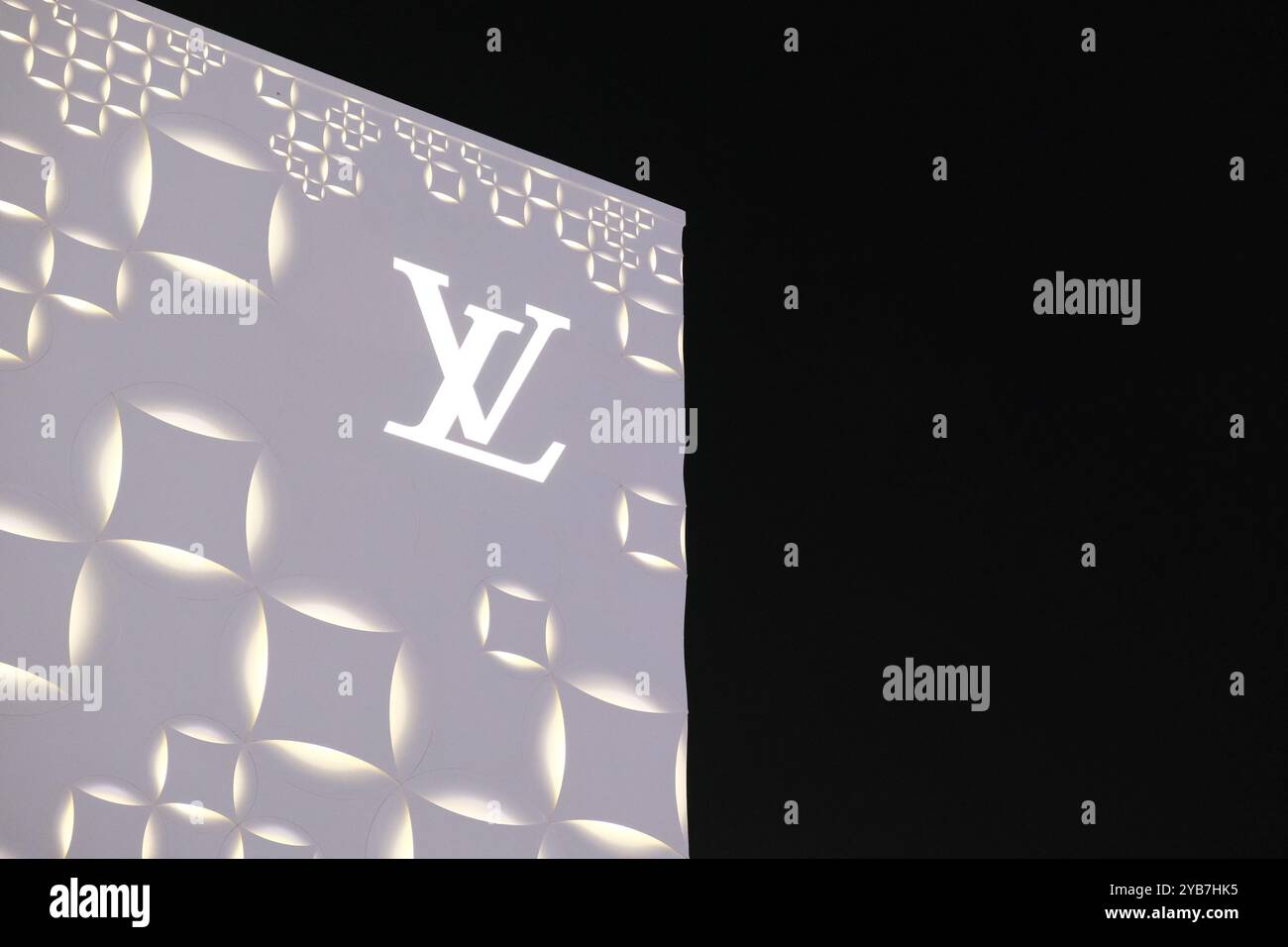 LV Louis Vuitton store brand logo Stock Photo - Alamy