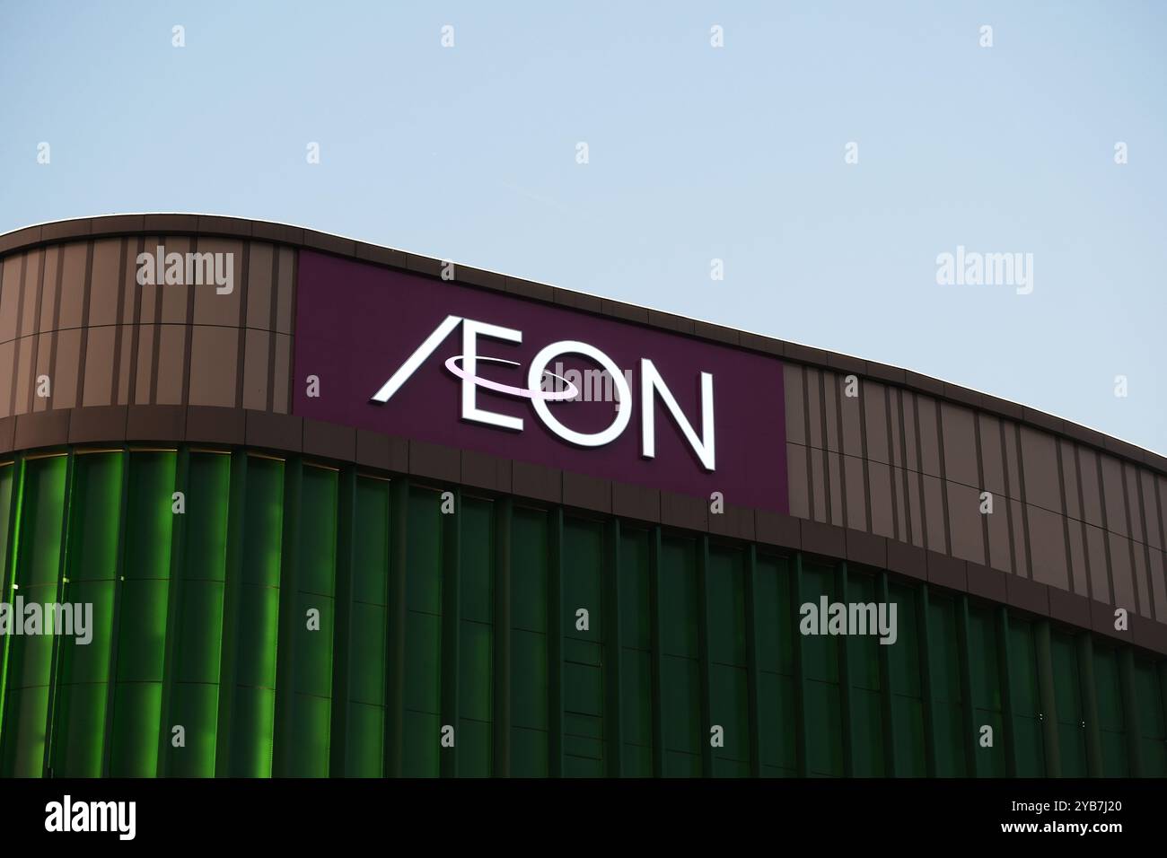 Wuhan,China-Feb.12th 2024: Aeon shopping mall brand logo sign. Aeon is ...