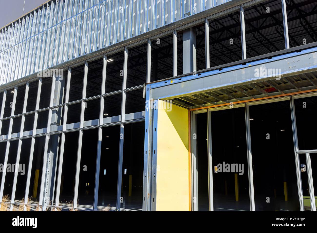 Large commercial buildings are constructed with steel beams profiles ...