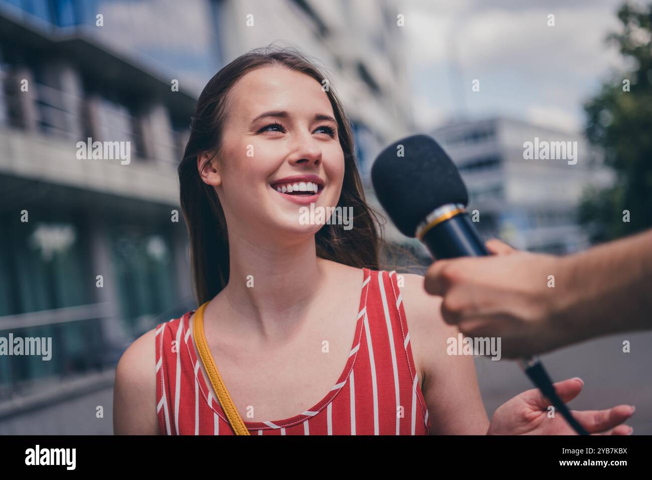 Photo of lovely cute popular girl giving interview to journalist ...