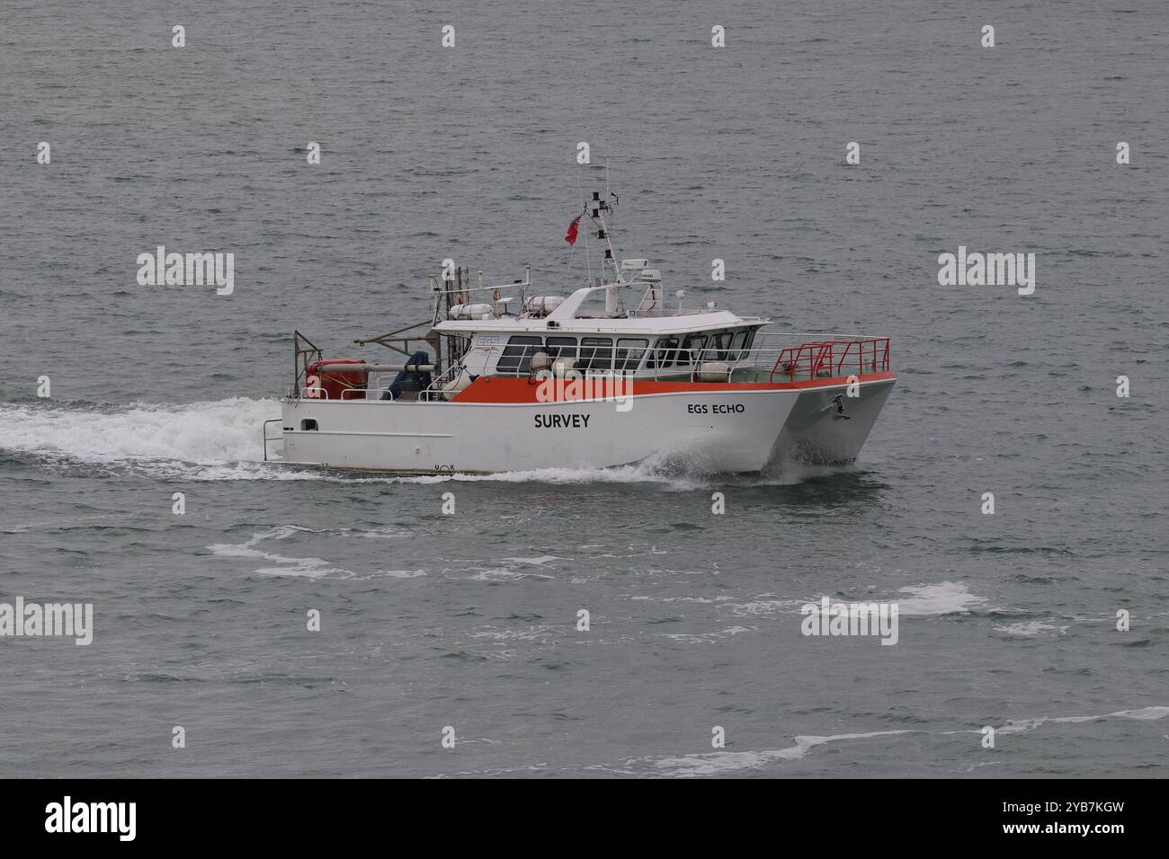 The EGS International owned coastal survey vessel EGS ECHO speeds towards harbour Stock Photo ...