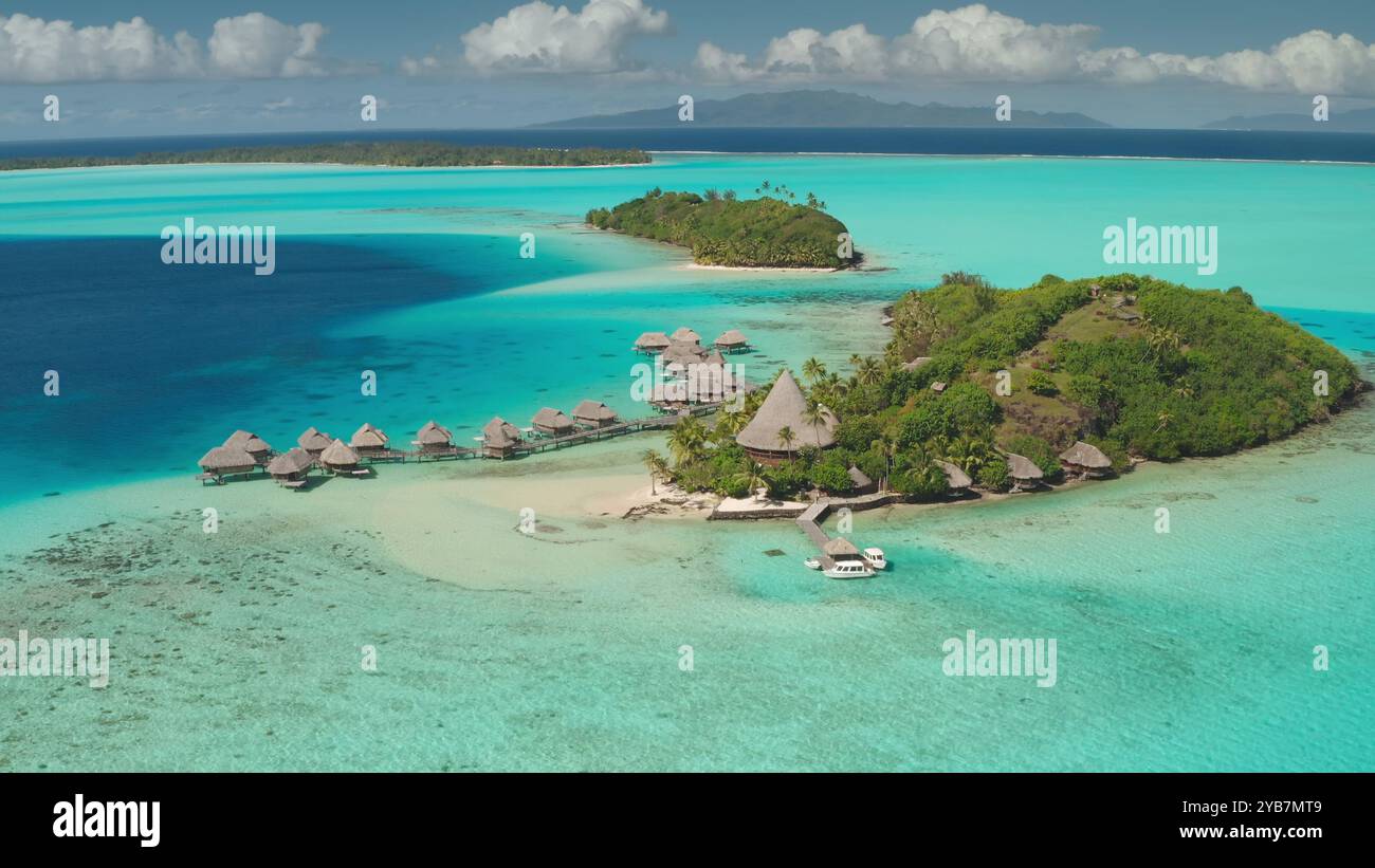 Aerial view of luxury resort in tropic Bora Bora, French Polynesia ...