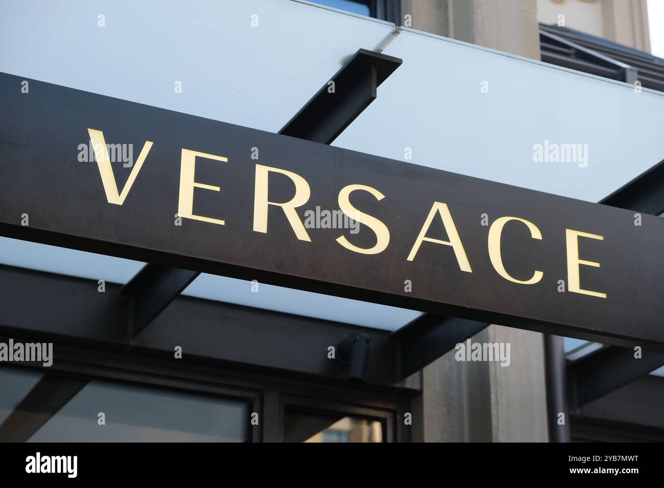 Versace store sign company brand logo Stock Photo - Alamy