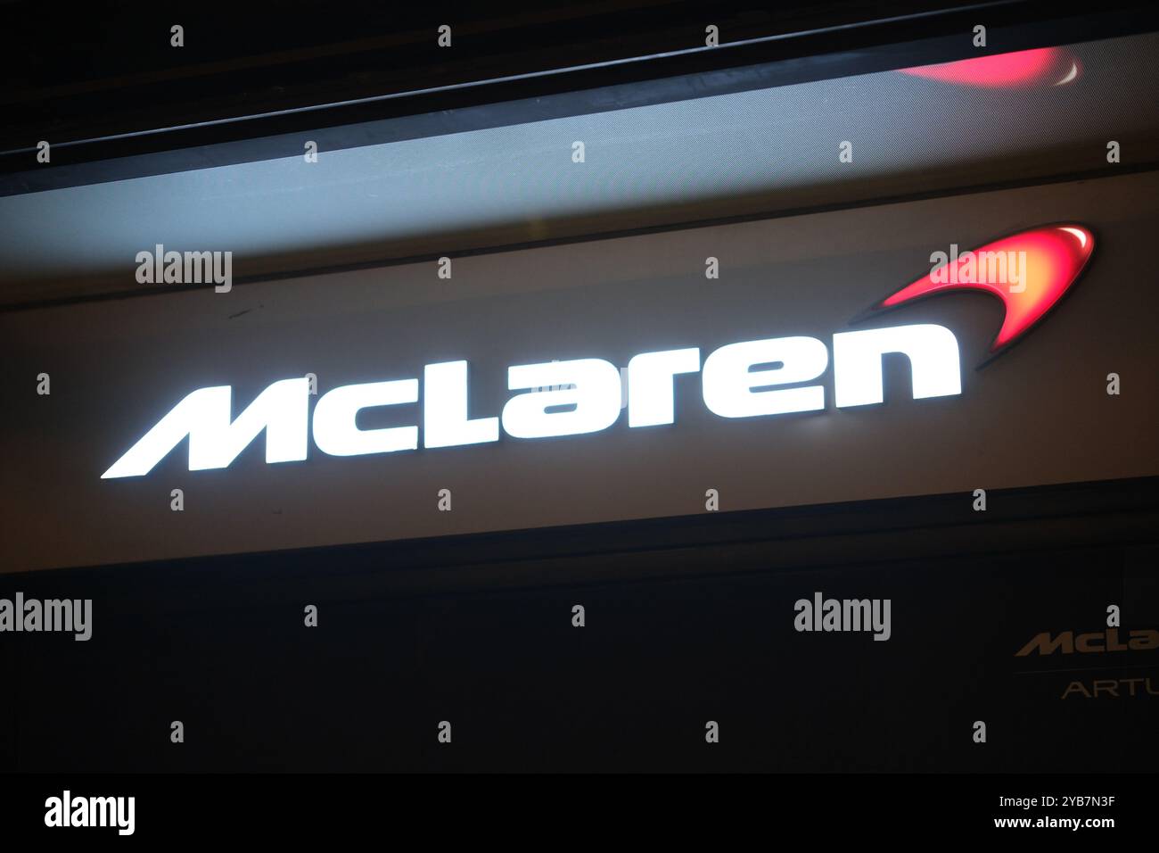 McLaren Automotive store sign company brand logo Stock Photo - Alamy