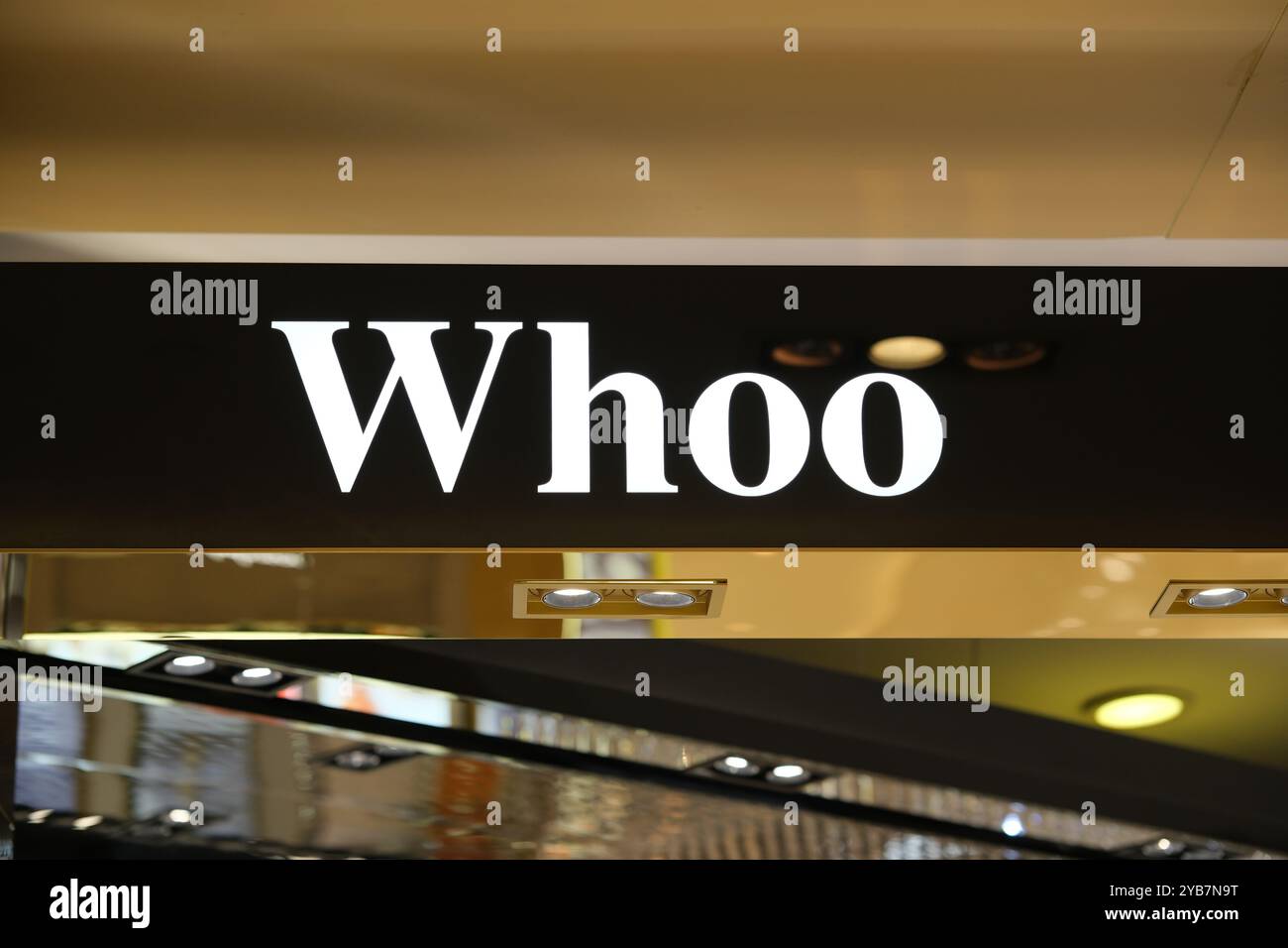 Whoo store brand logo sign Stock Photo - Alamy
