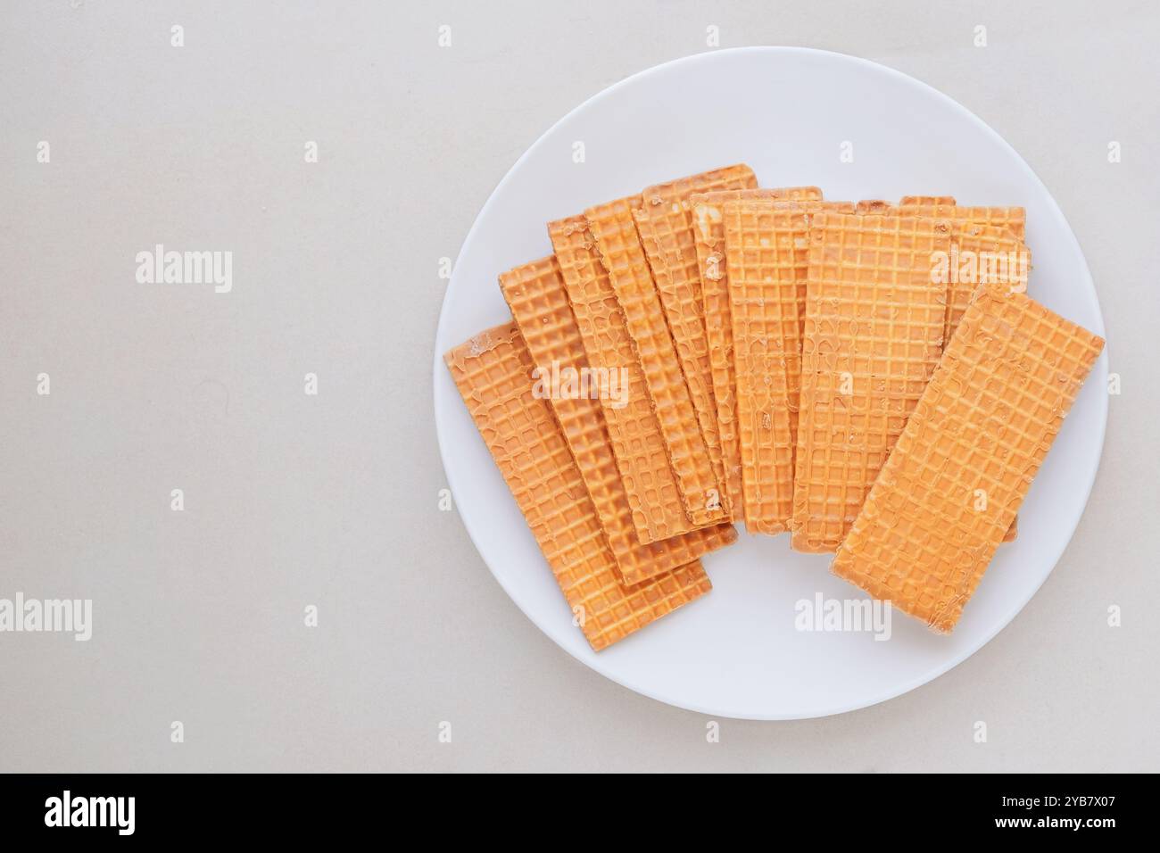 Waffles with chocolate coating. Belgian dessert. Waffles in ceramic ...
