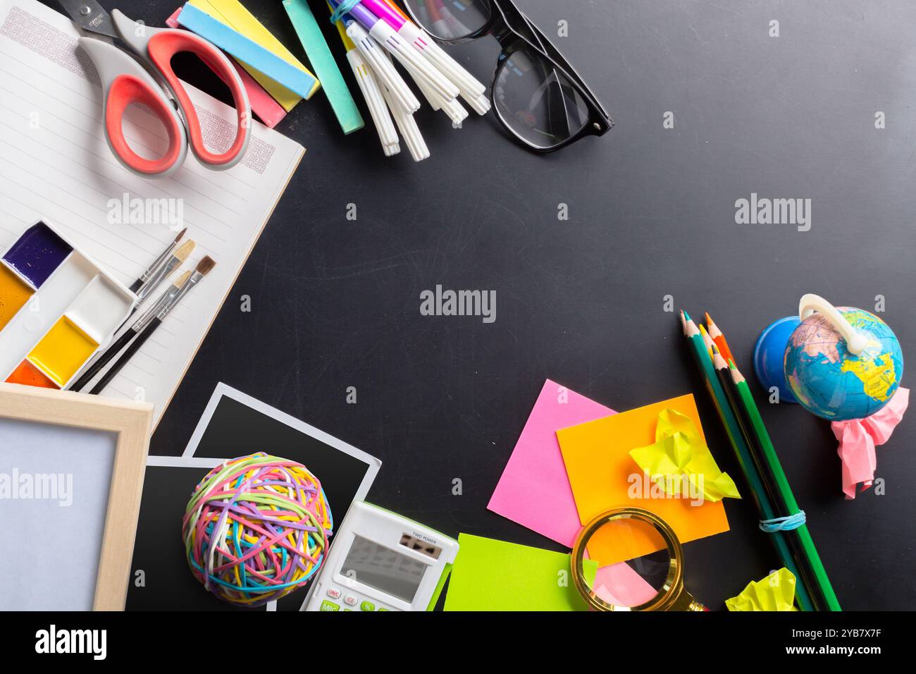 Desk of an artist with lots of stationery objects Stock Photo - Alamy