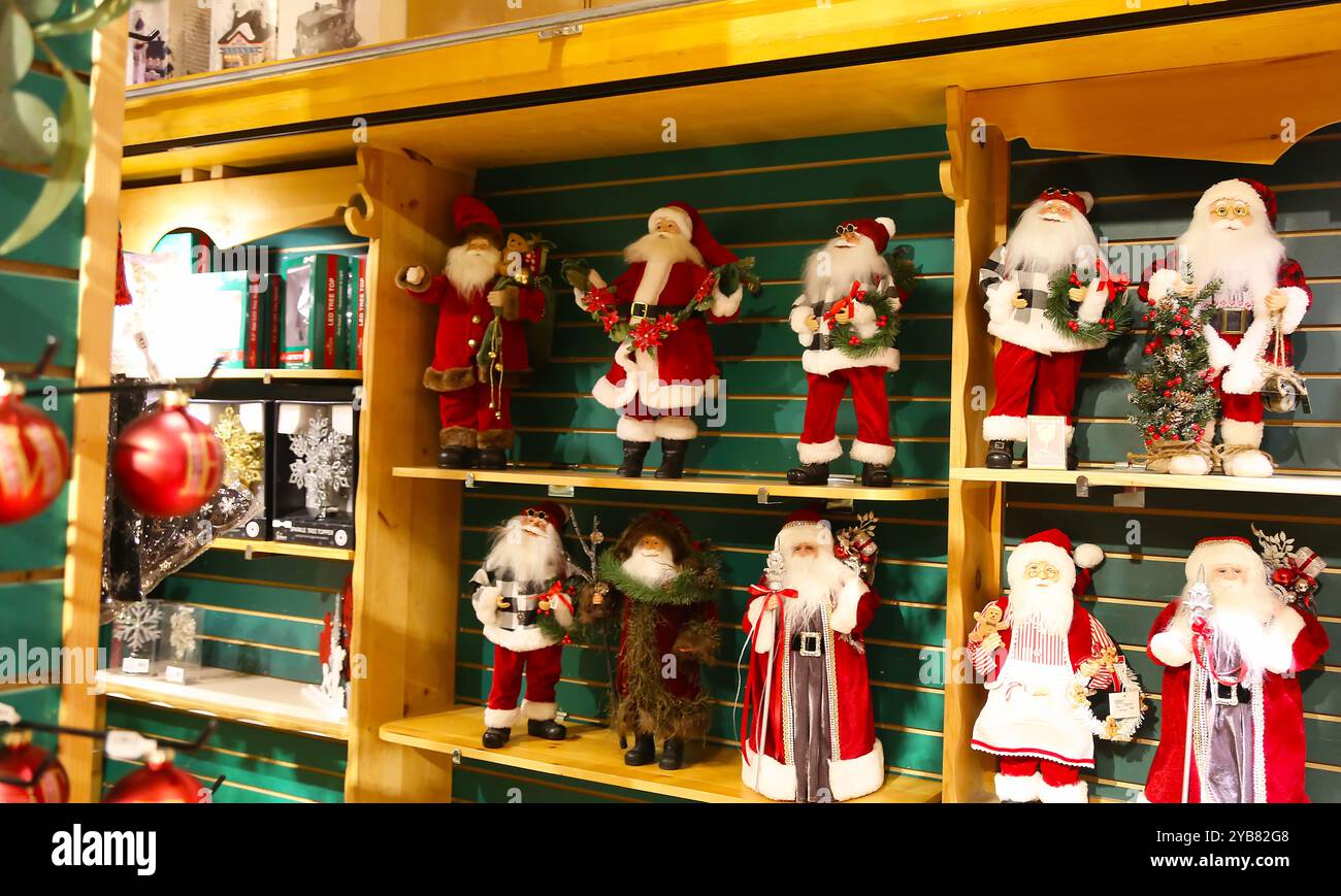Various Santa Claus, Elves and Angels figures in the store. Decorate ...