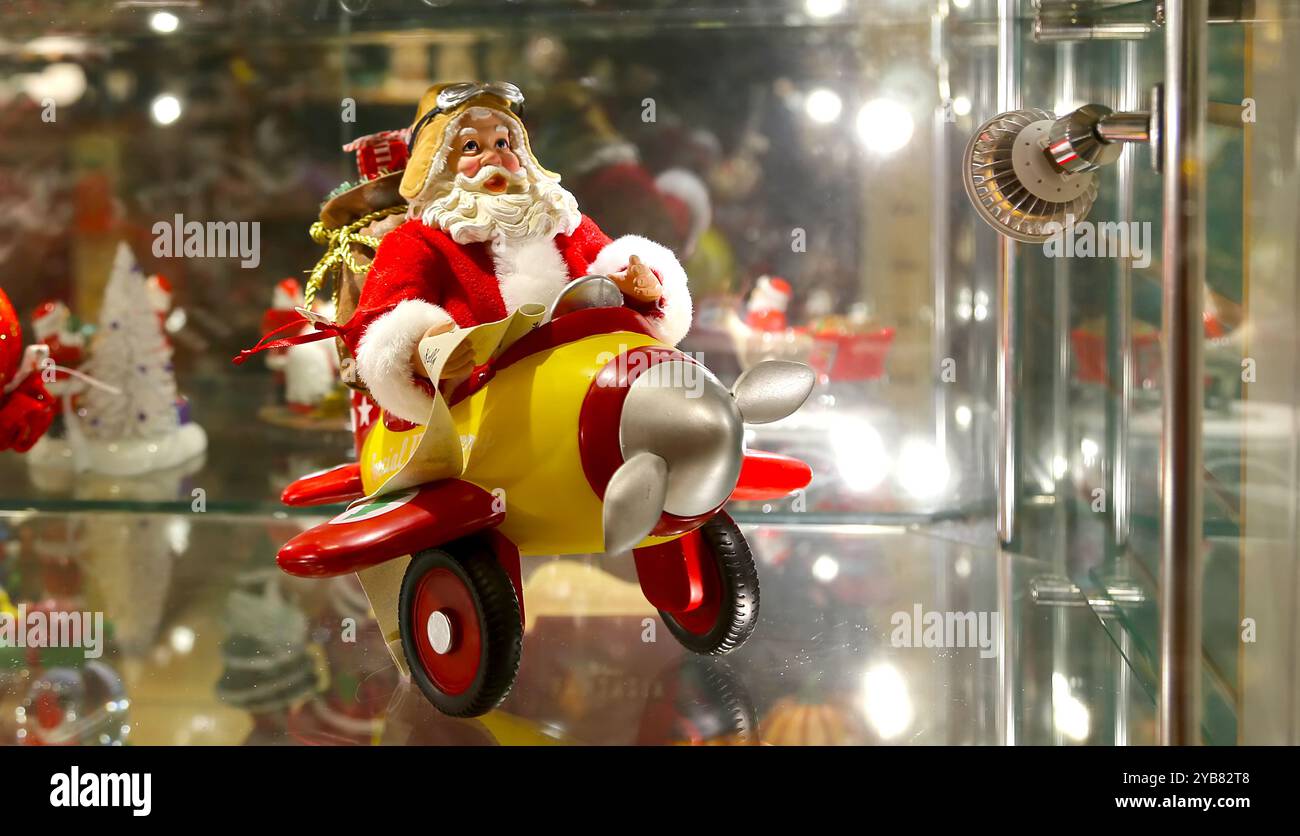 Various Santa Claus, Elves and Angels figures in the store. Decorate ...