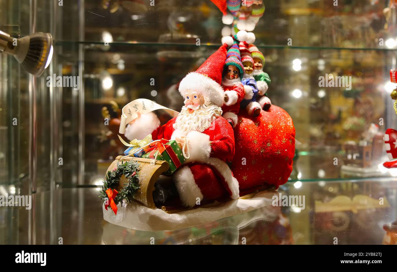 Various Santa Claus, Elves and Angels figures in the store. Decorate ...