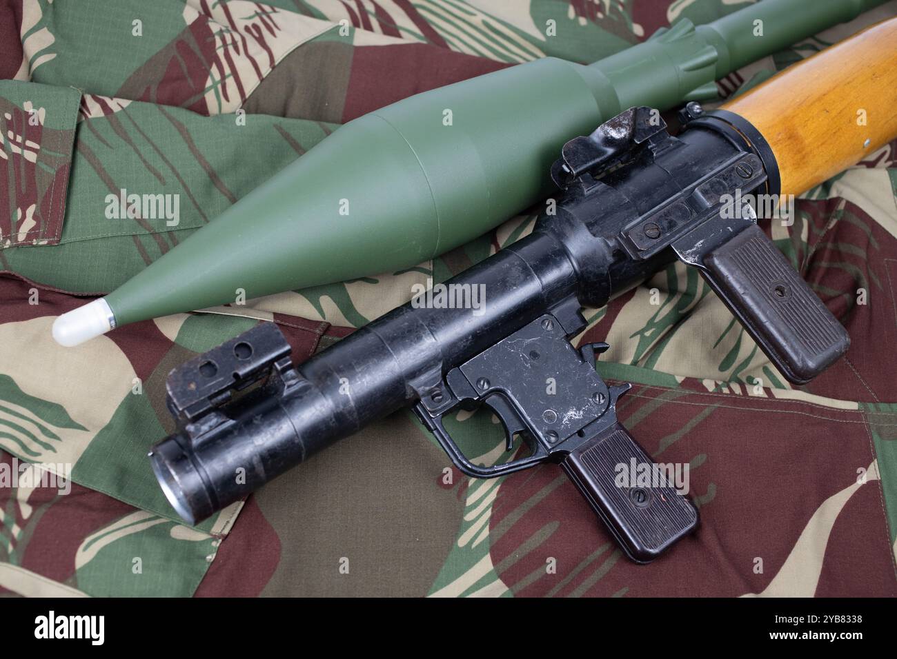 rocket propelled grenade launcher RPG 7 on camo uniform background ...
