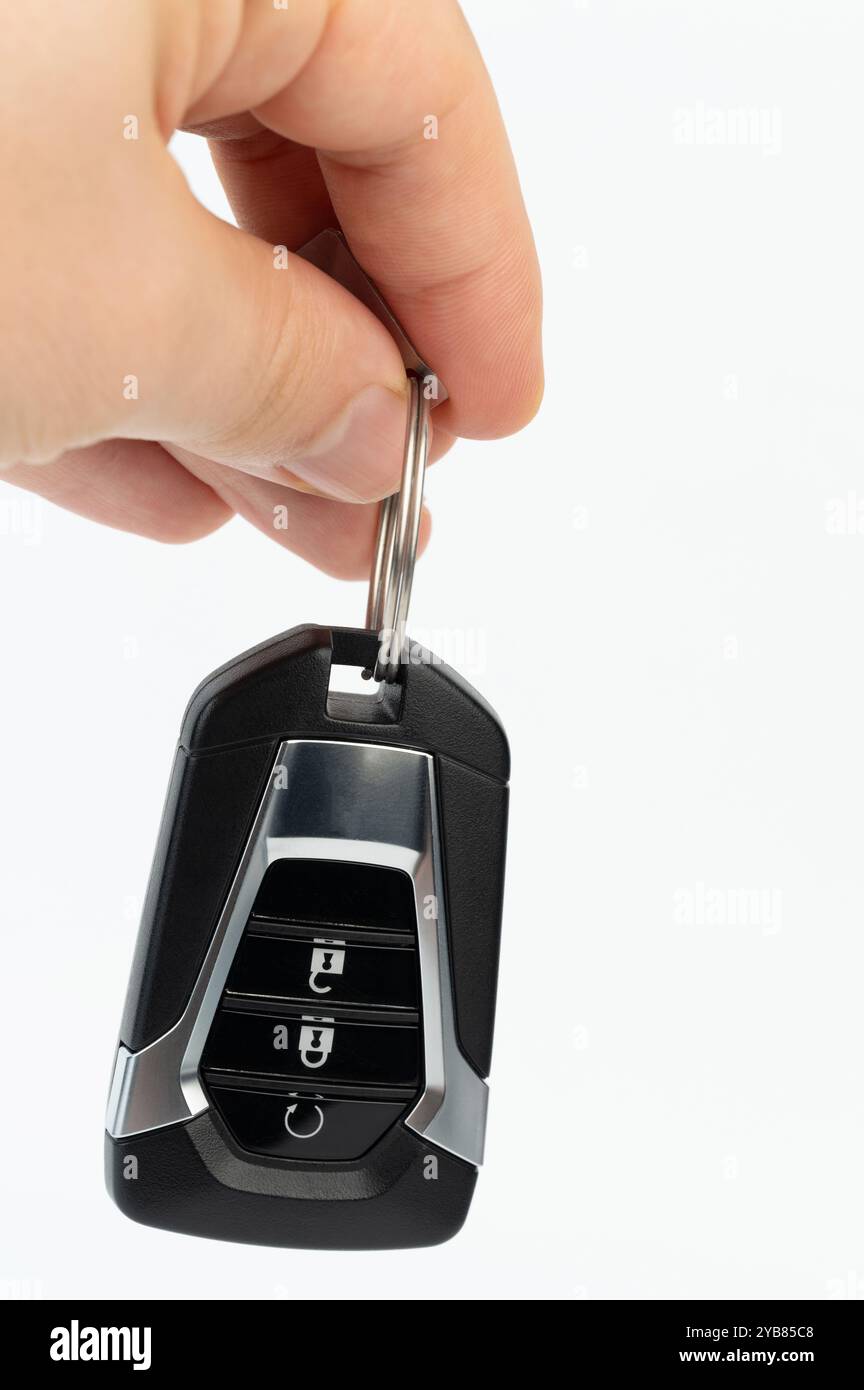 Remote wireless car key in chain isolated on white studio background ...