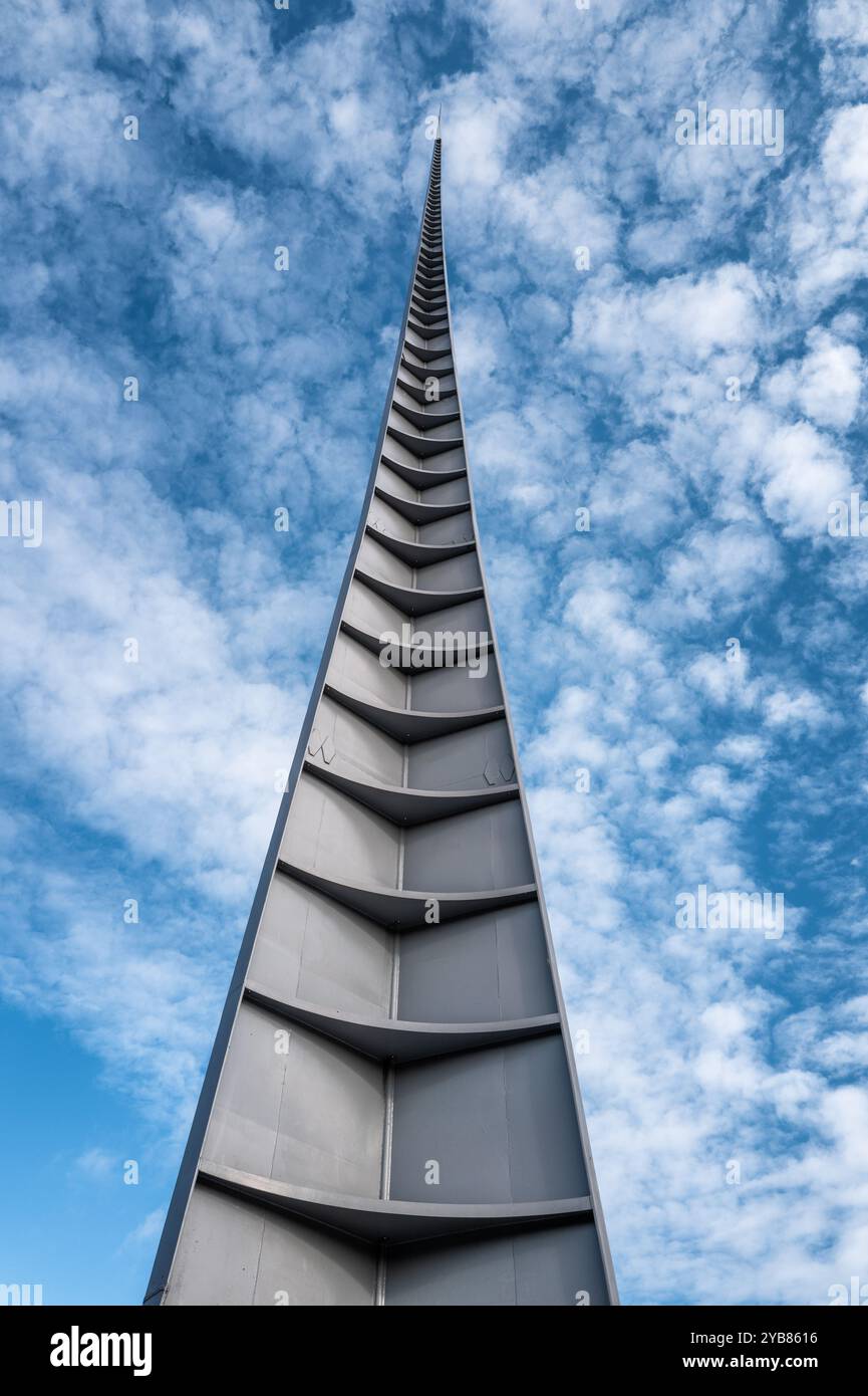 A stunning architectural scene featuring tall, vertical columns against ...