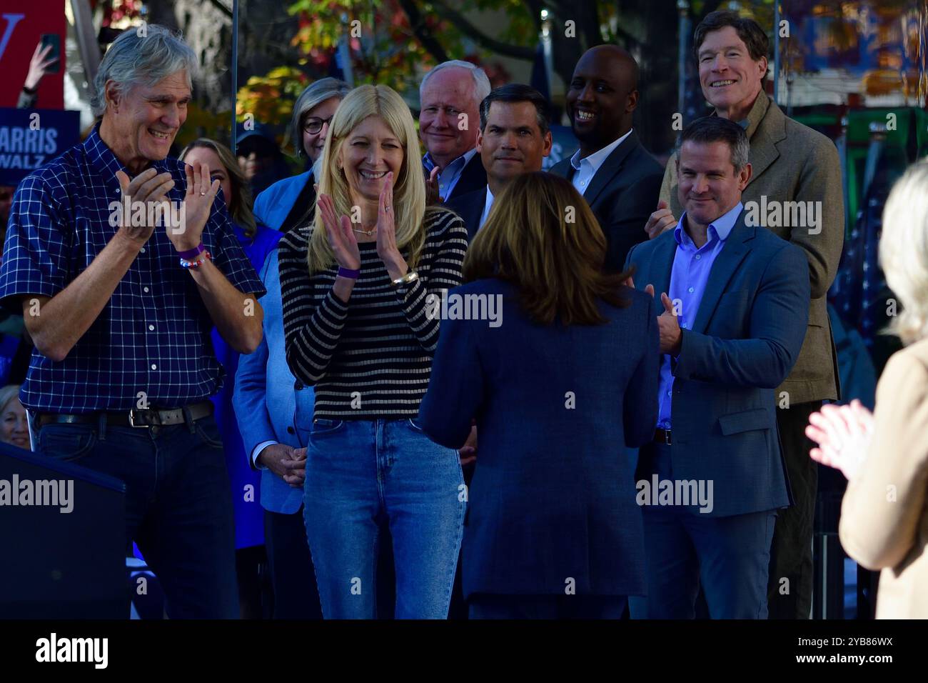 Bob and Kristina Lange share the stage with VP Kamala Harris during a ...