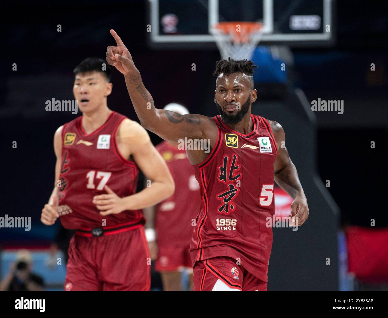 (241017) -- BEIJING, Oct. 17, 2024 (Xinhua) -- Eugene German (R) of ...