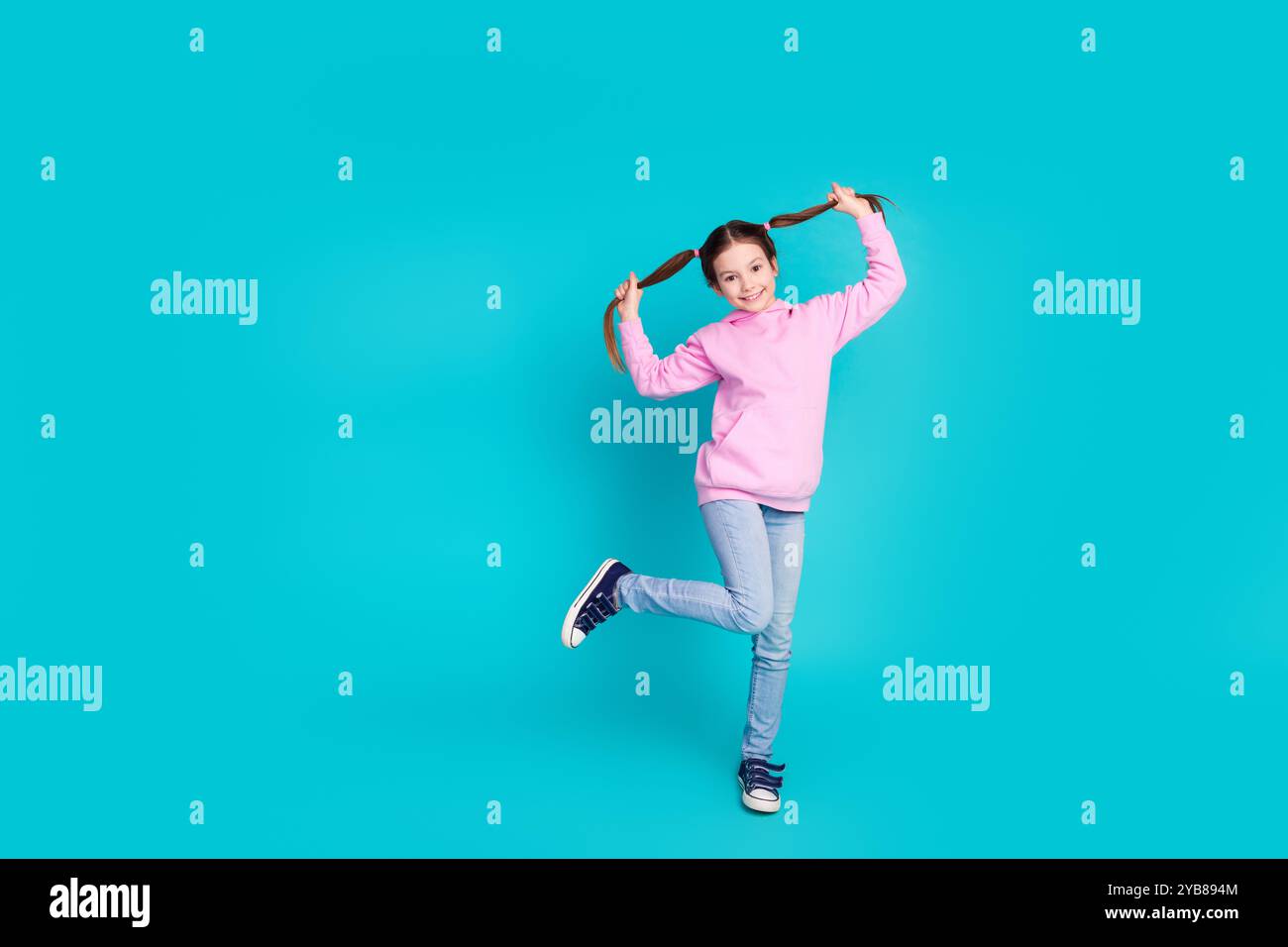 Full size photo of pretty little girl pull tails have fun wear trendy ...