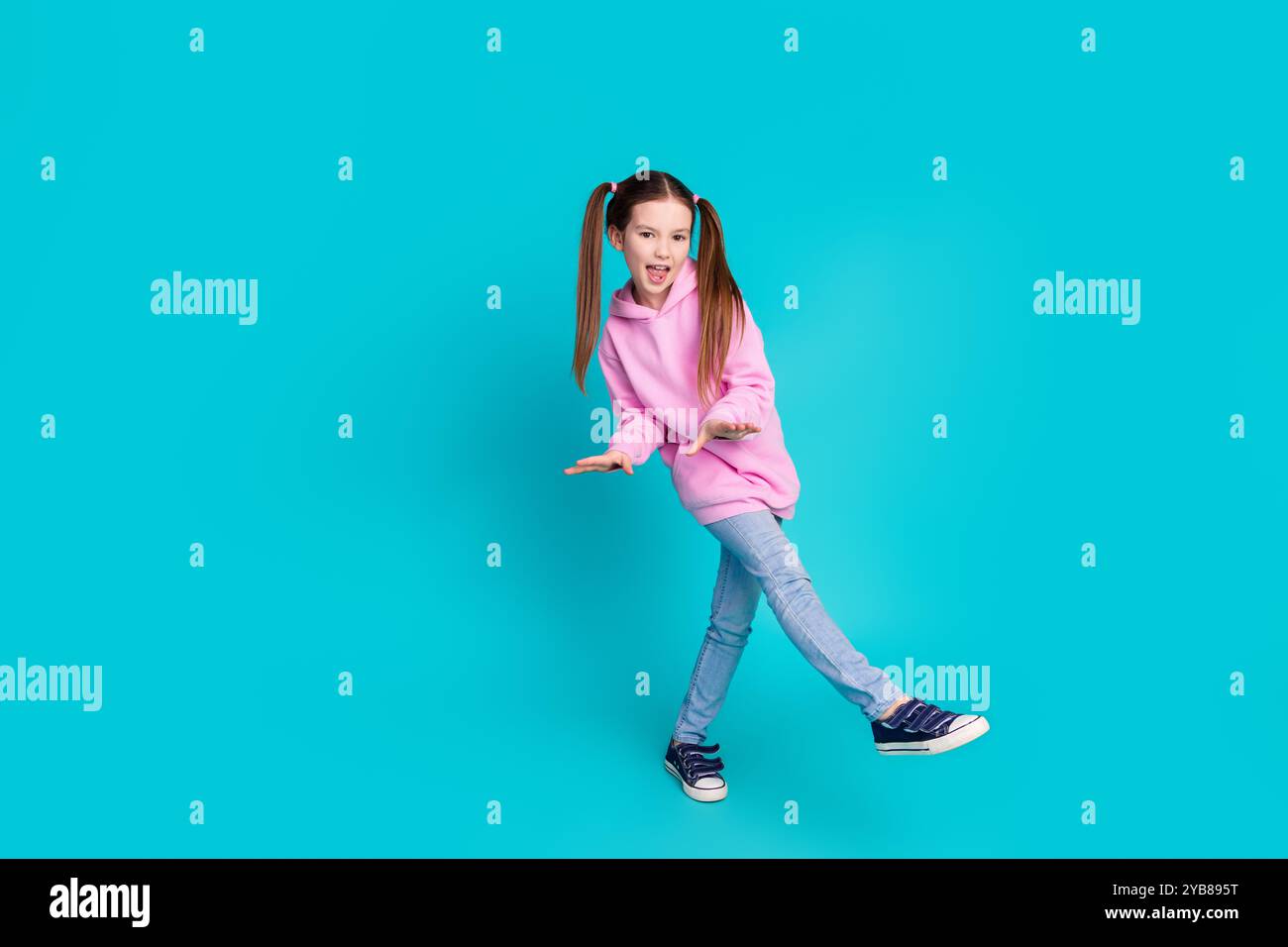 Full size photo of pretty little girl dancing have fun wear trendy pink ...