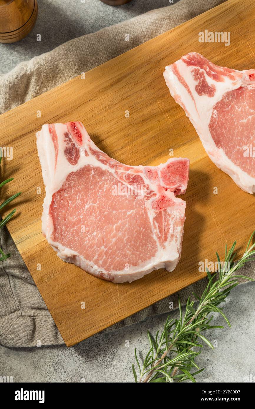 Organic Raw Bone in Pork Chops Ready to Cook Stock Photo - Alamy