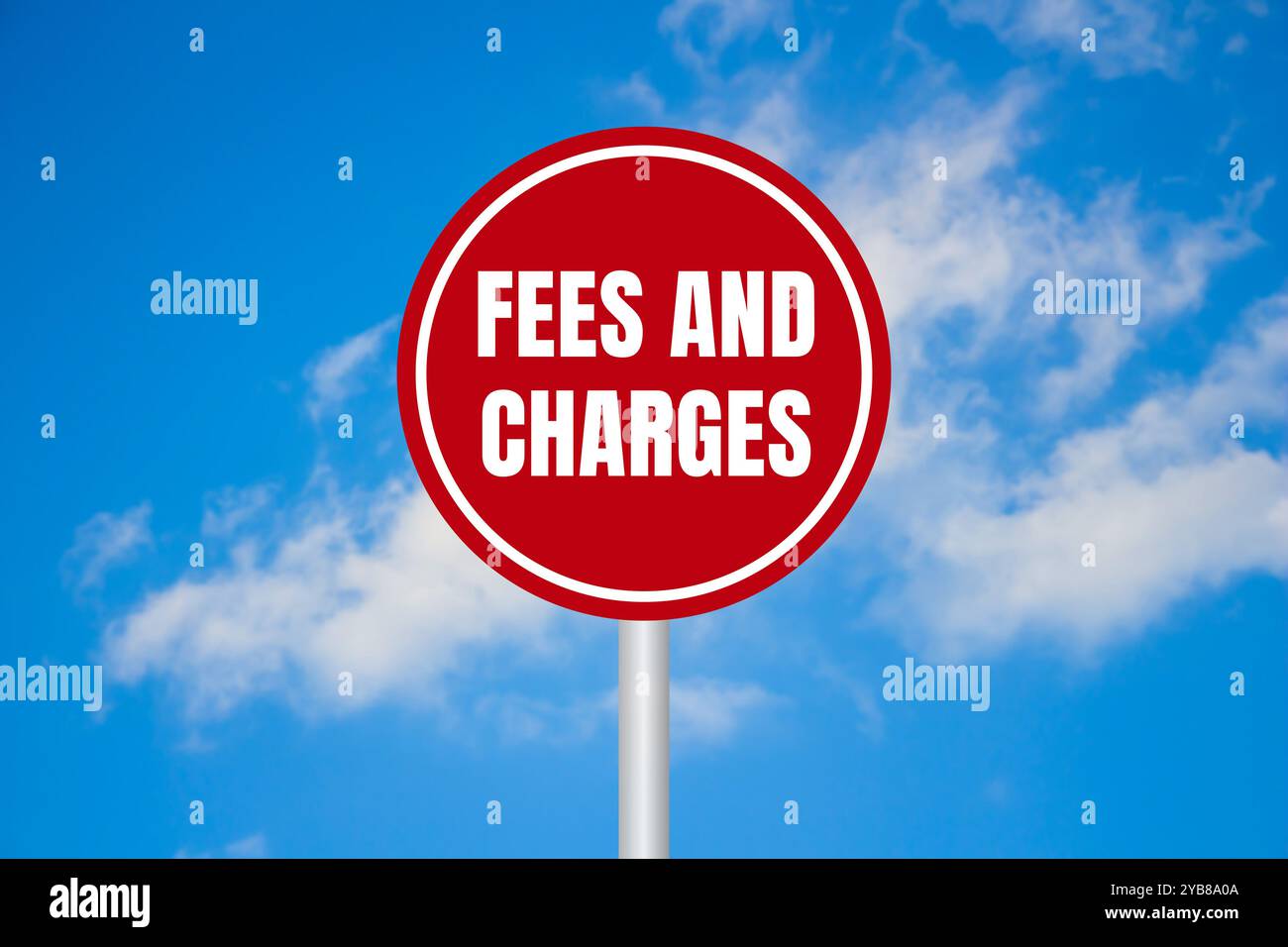 Fees and charges message written on red round sign on blue sky ...