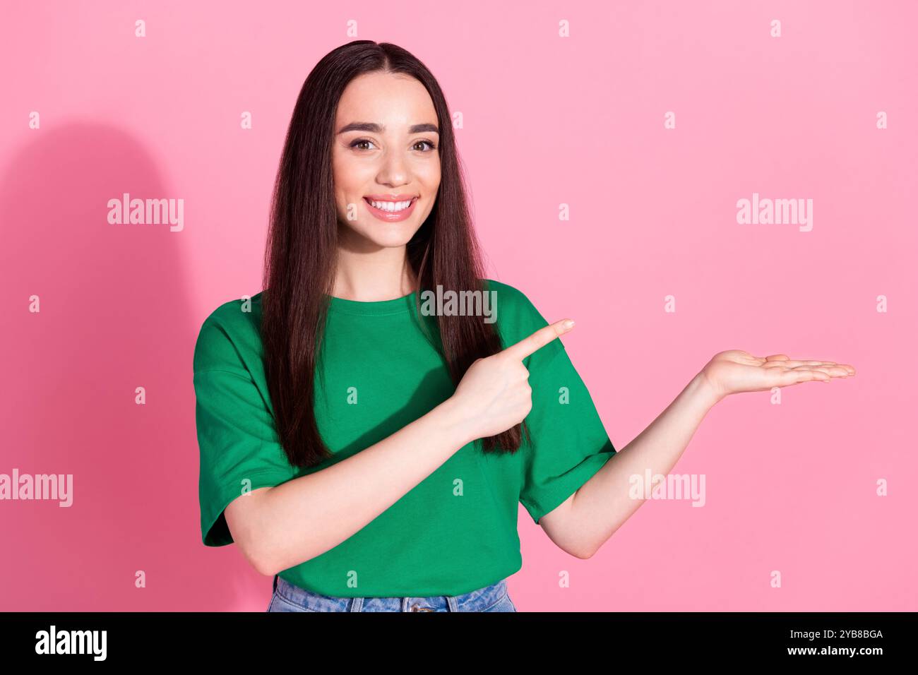 Photo of charming positive woman wear green t-shirt pointing finger ...