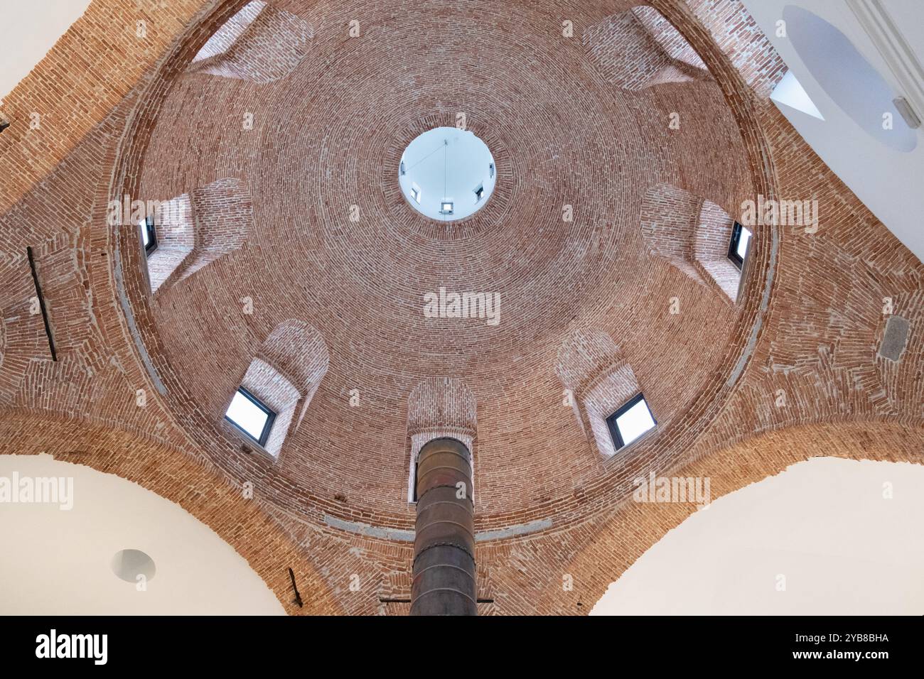 Impressive brick vault with windows and a lantern that let light into ...