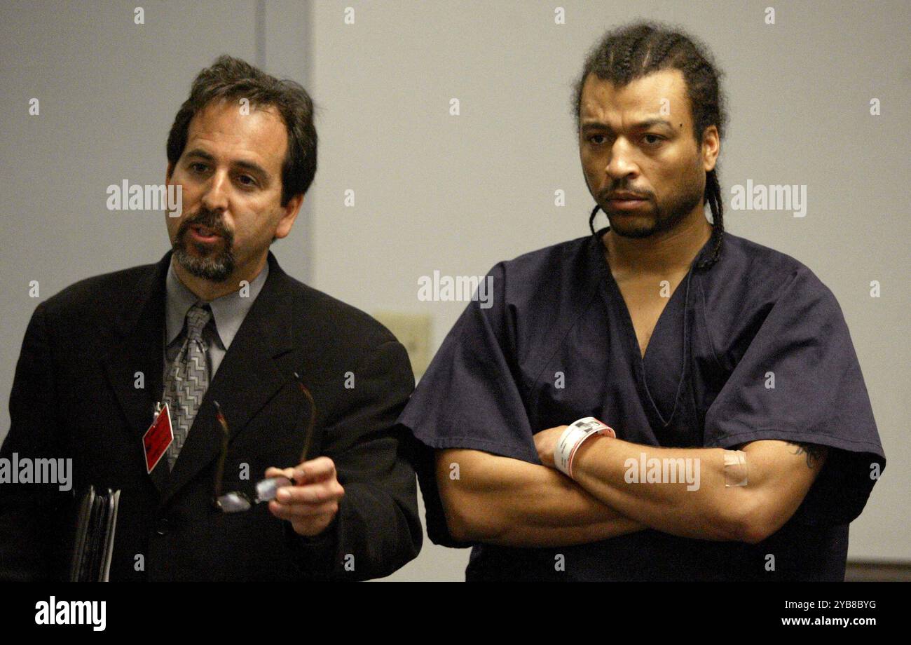 FILE - Lawyer Drew Findling, left, speaks before the bench alongside ...