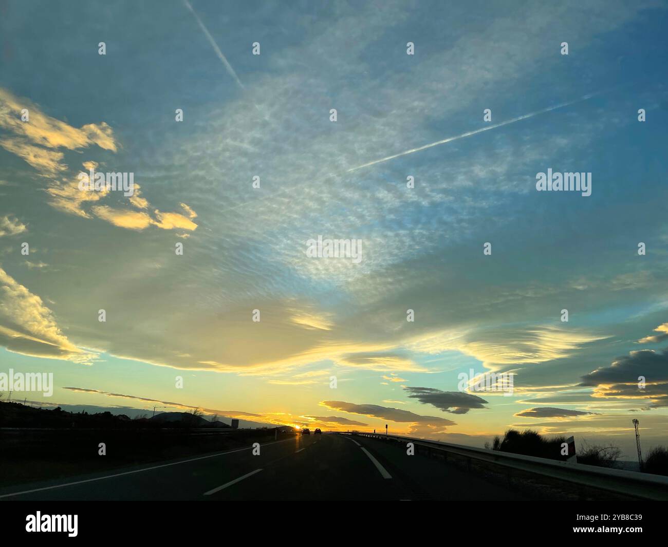 Sunset sky and highway Stock Photo - Alamy