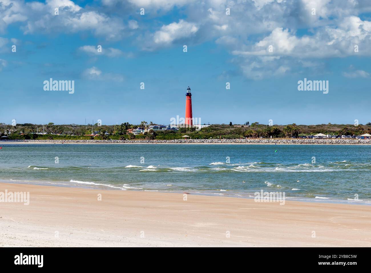 Sunny beach and Lighthouse Ponce de Leon Inlet from New Smyrna beach ...