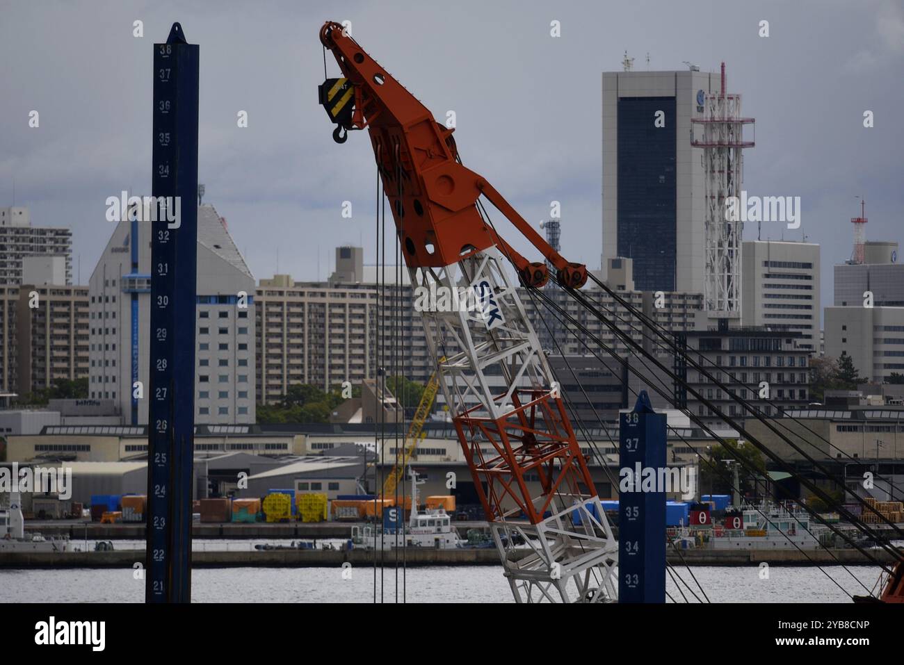 Cargo loading crane at the industrial Port of Kobe in Kansai, Hyōgo ...