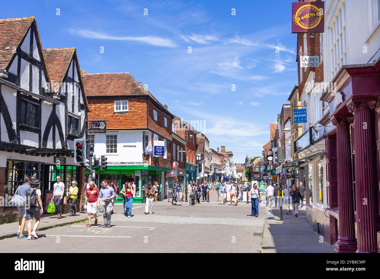 Salisbury High street with people shopping on the Busy High street UK ...