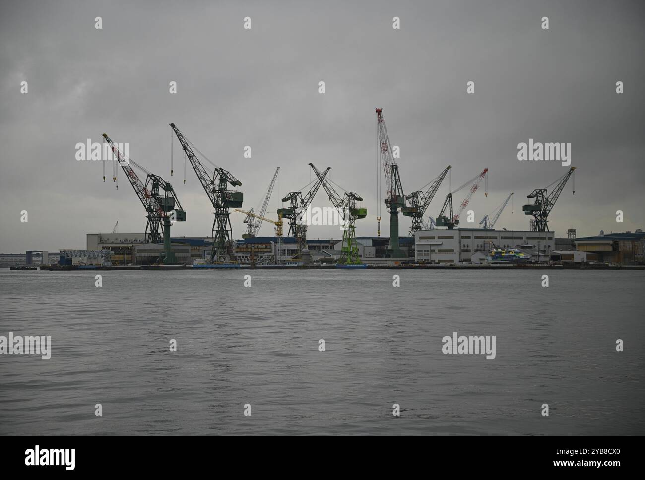 Scenic view of shipyard cranes at the maritime Port of Kōbe in the ...